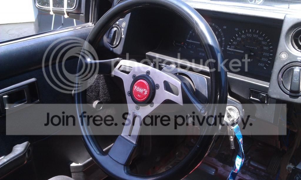 Toms 360m steering wheel, horn button, nardi long hub